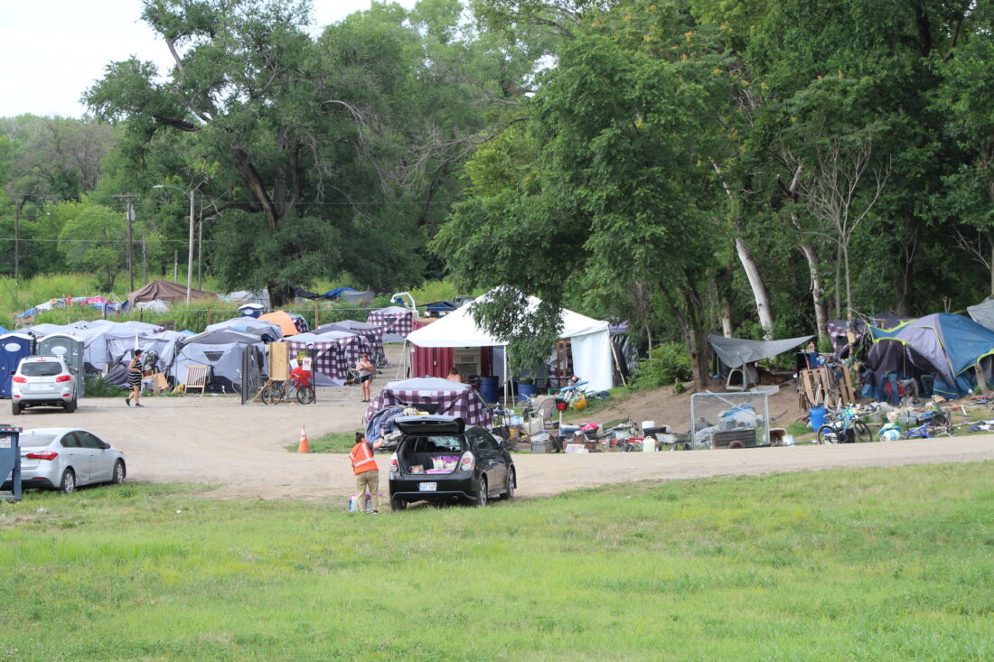 Resident of North Lawrence camp for homeless arrested on suspicion of ...